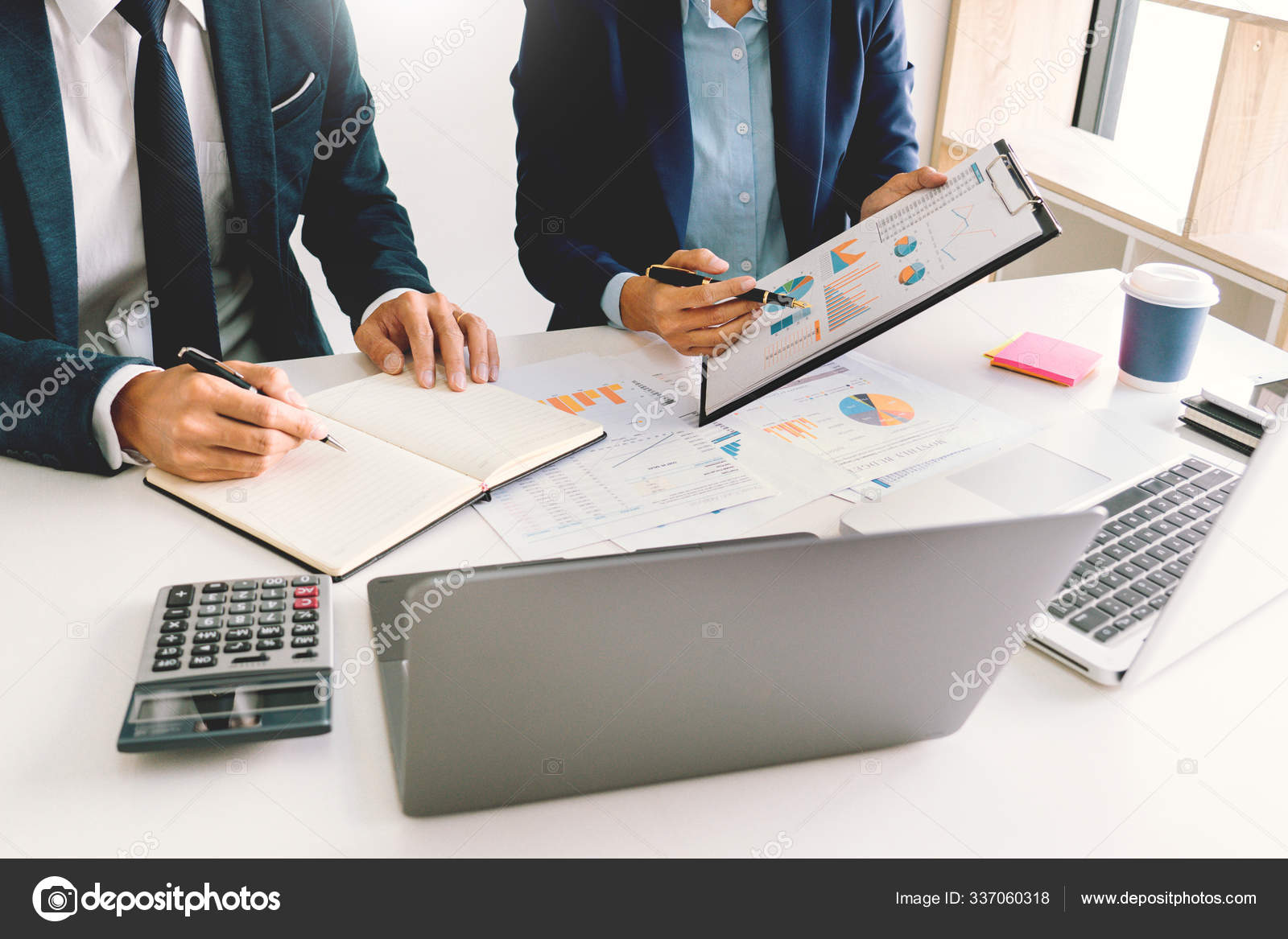 Manager giving advice to new entrepreneur and discussion with modern ...