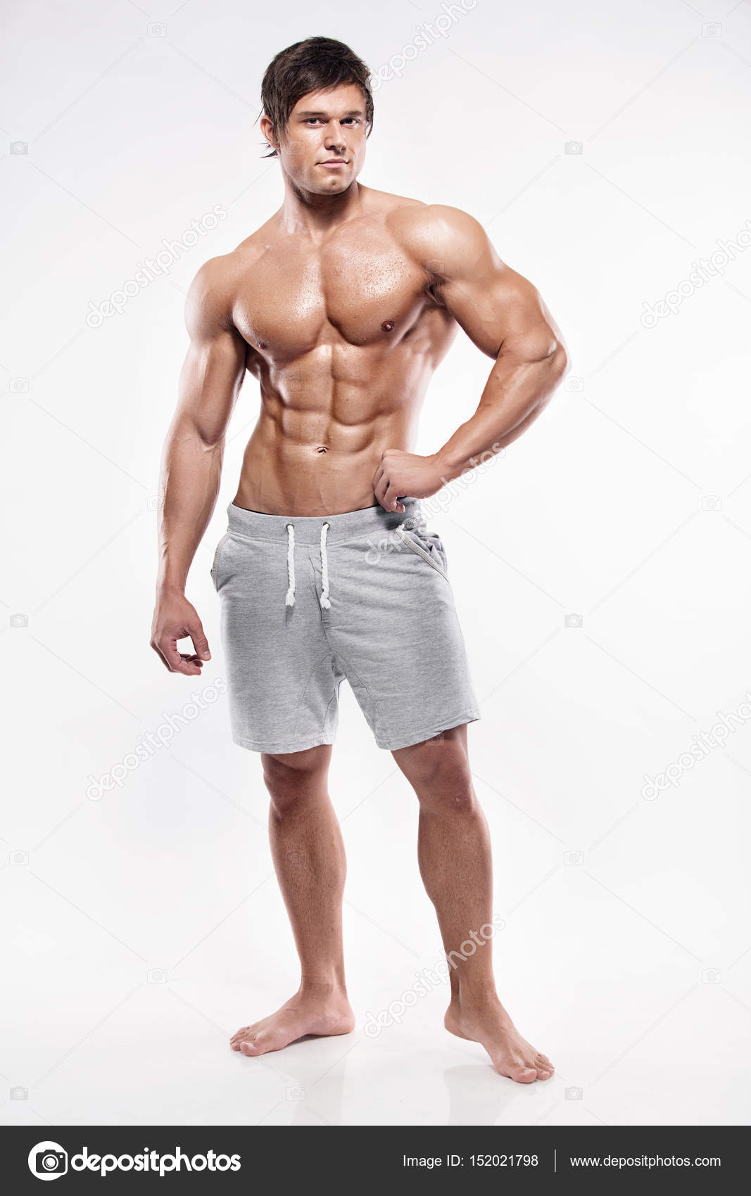 Strong Athletic Man showing muscular body Stock Photo by ©_italo_ 152021798