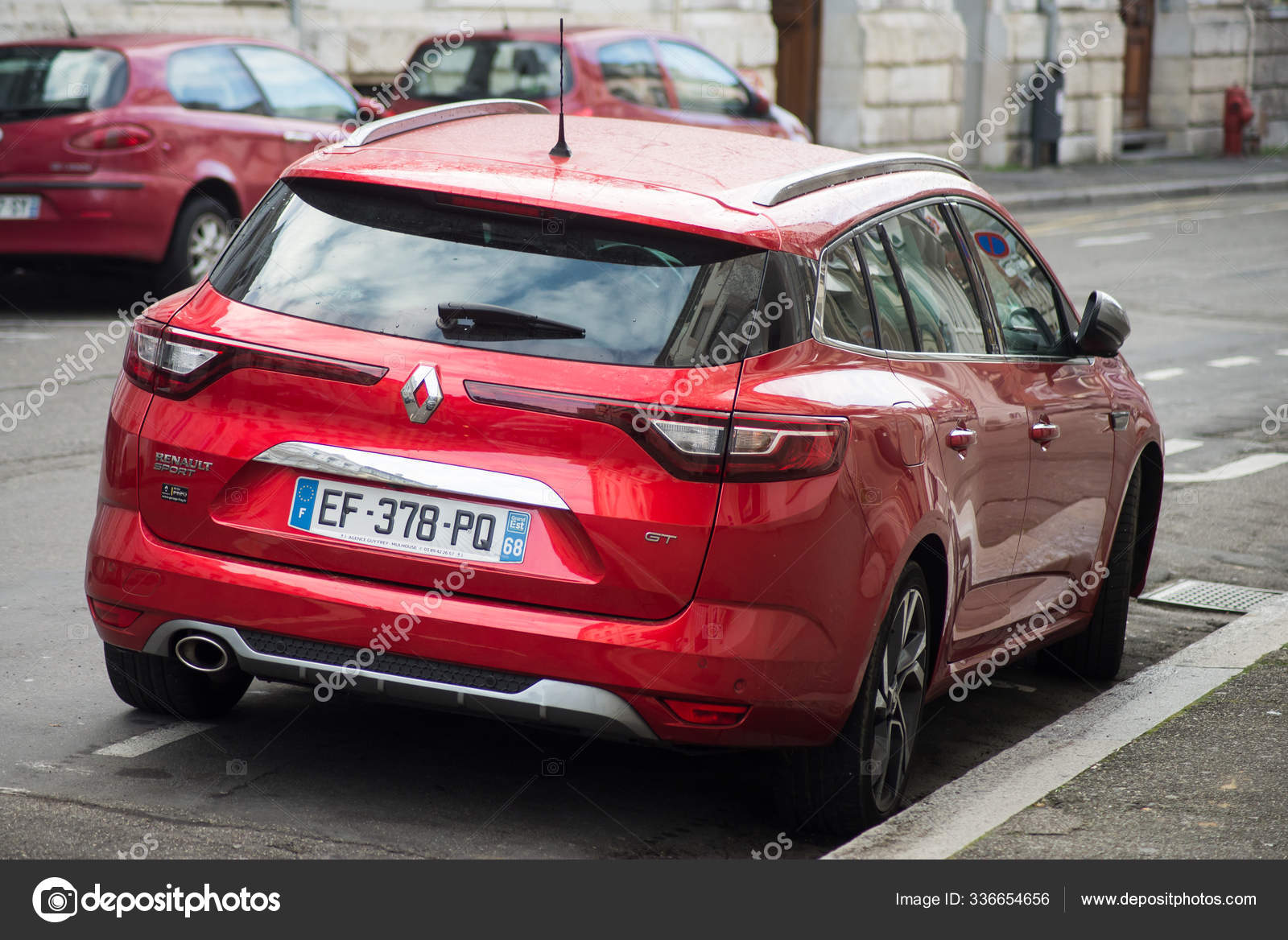 Rear view of red Renault Megane GT parked in the street – Stock ...