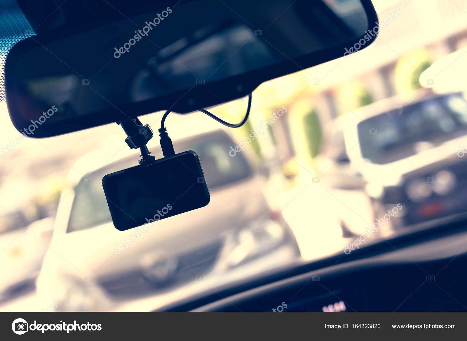 Driving car with video camera record technology on windscreen Stock ...