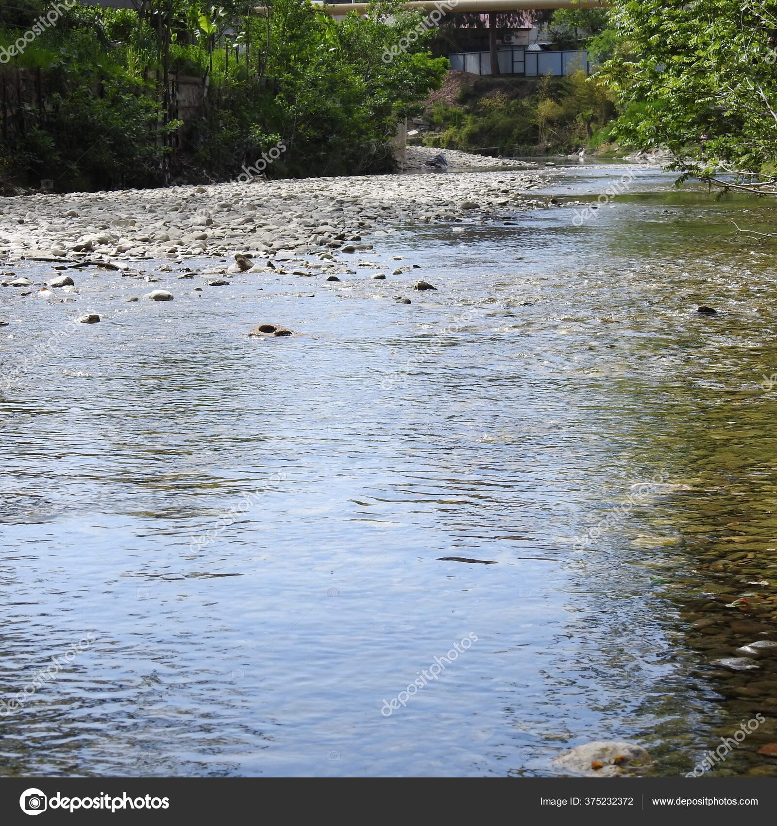 Shallow River Rocky Bed — Stock Photo © Igchchn #375232372