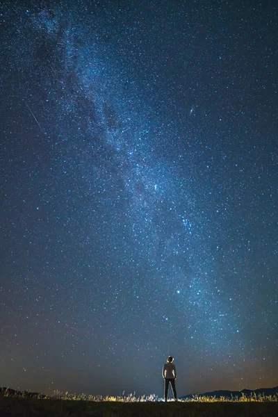 Man Standing Picturesque Starry Sky Background — Stock Photo © DPimage ...