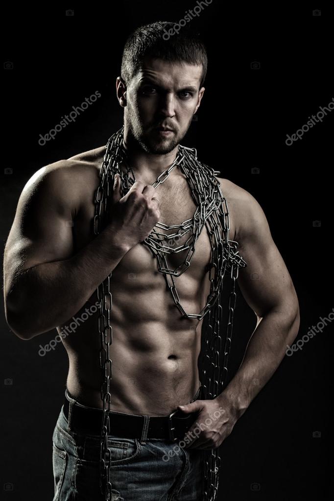 Muscular man with rope Stock Photo by ©Tverdohlib.com 126421694