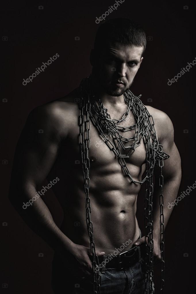 Muscular man with rope Stock Photo by ©Tverdohlib.com 126422568