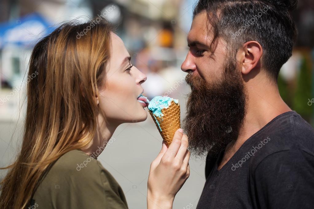 couple eating ice cream — Stock Photo © Tverdohlib.com #128058836