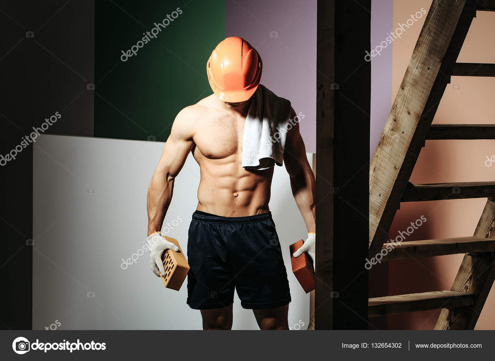 Sexy muscular man builder on ladder Stock Photo by ©Tverdohlib.com ...