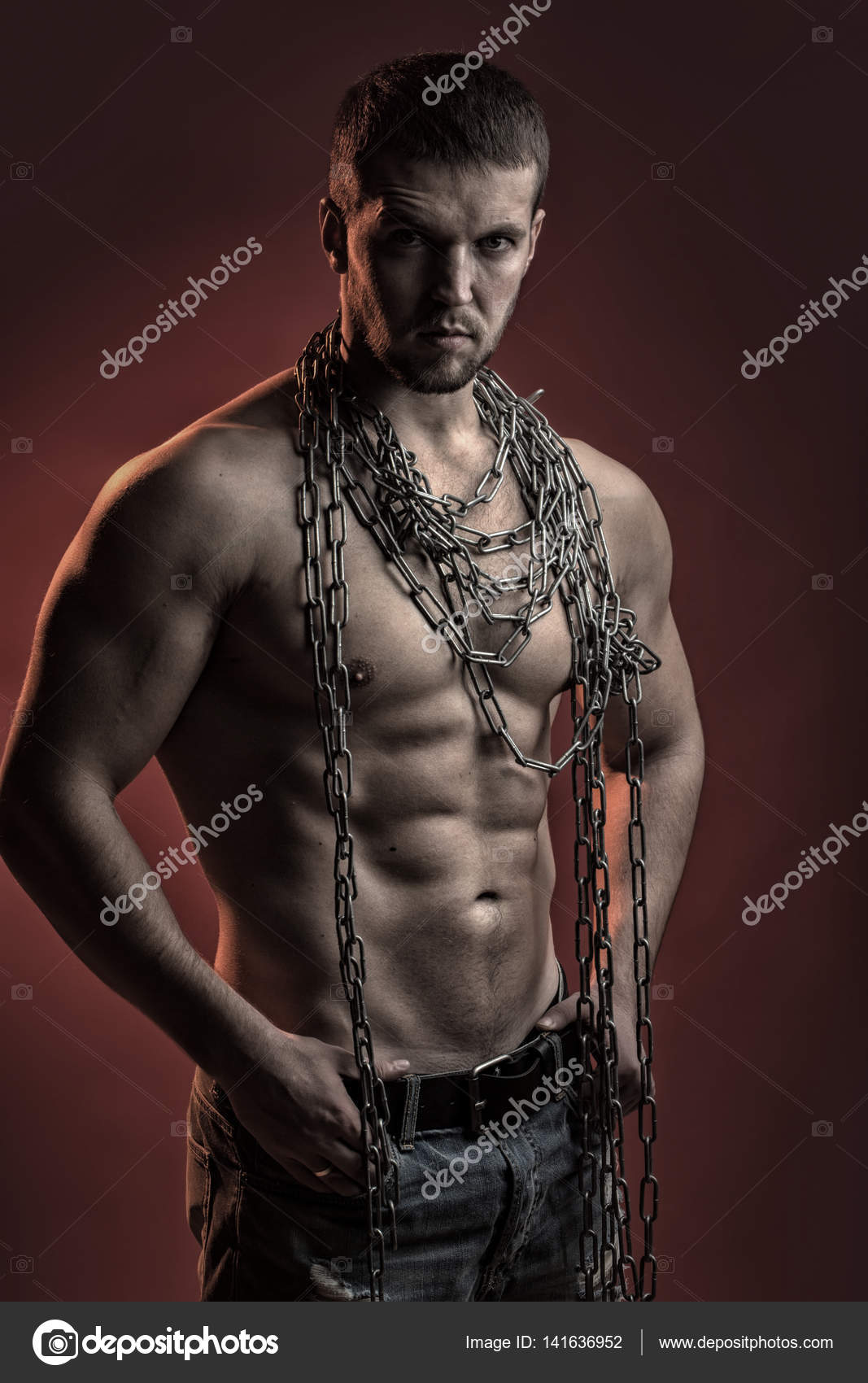 Muscular man with rope Stock Photo by ©Tverdohlib.com 141636952
