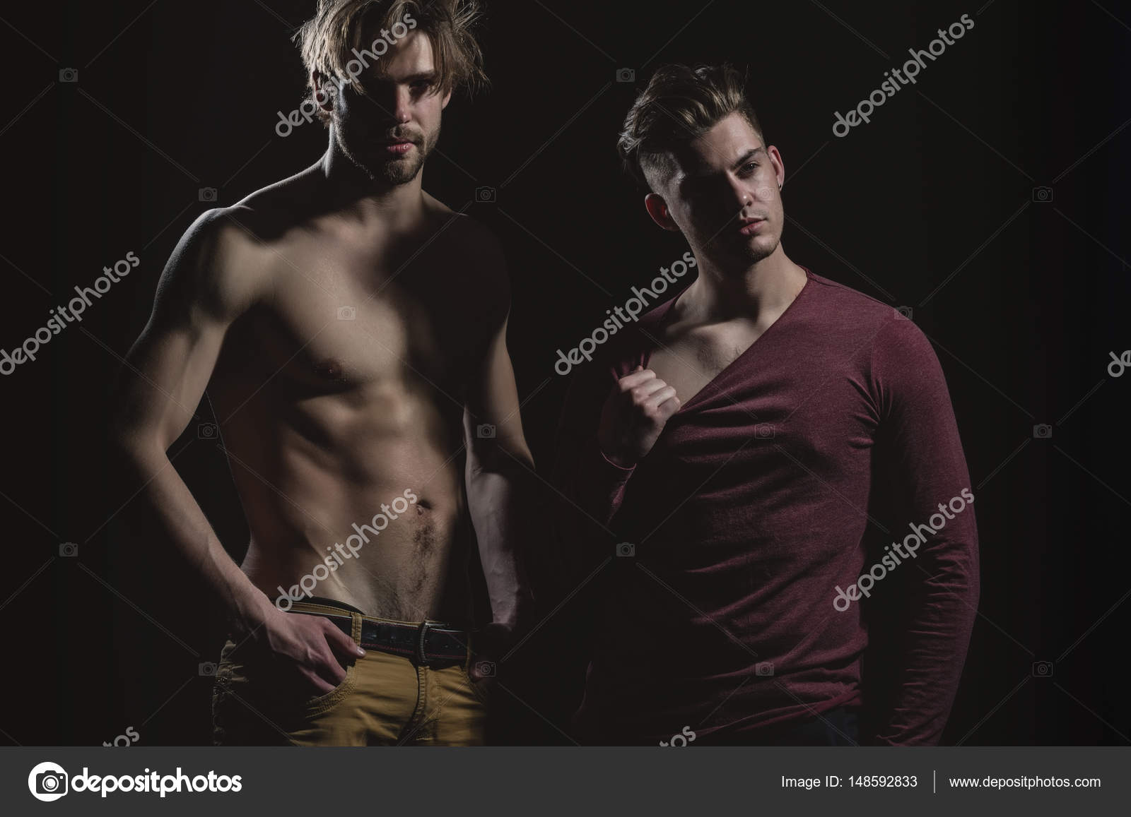 Two handsome men posing Stock Photo by ©Tverdohlib.com 148592833