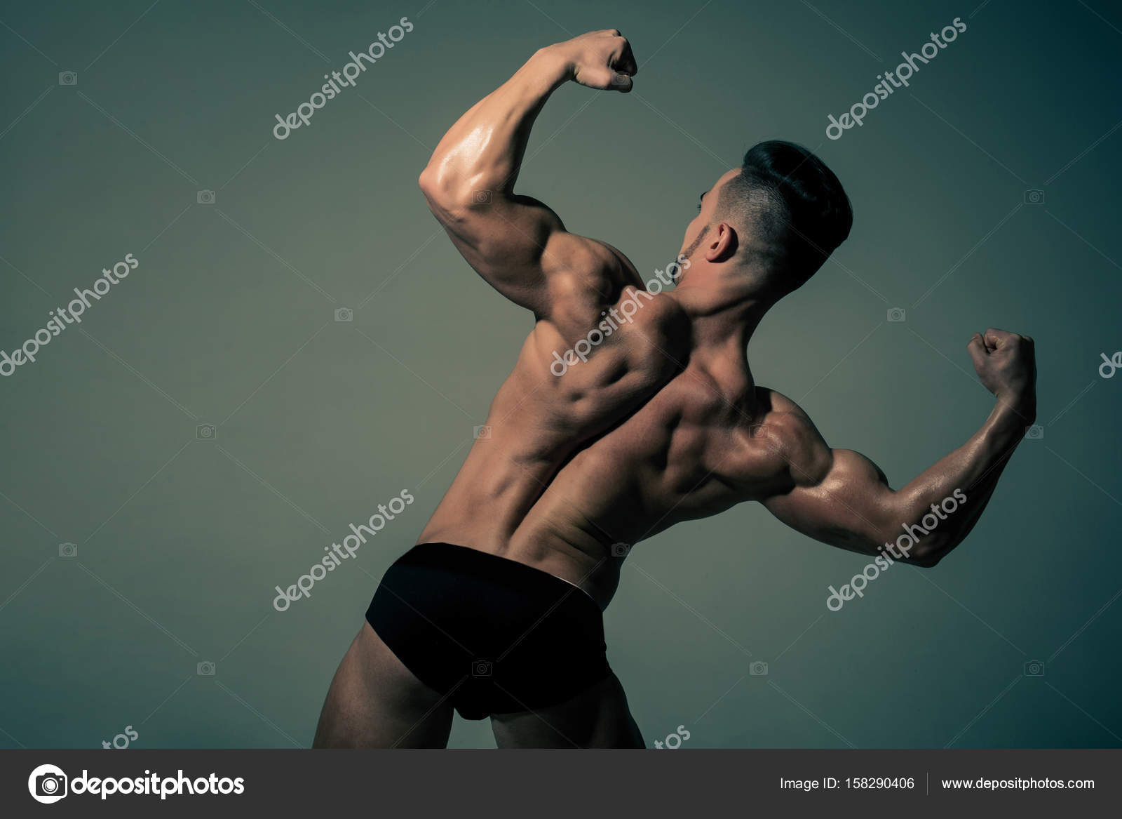 Athlete with muscular body and back in underwear pants — Stock Photo ...