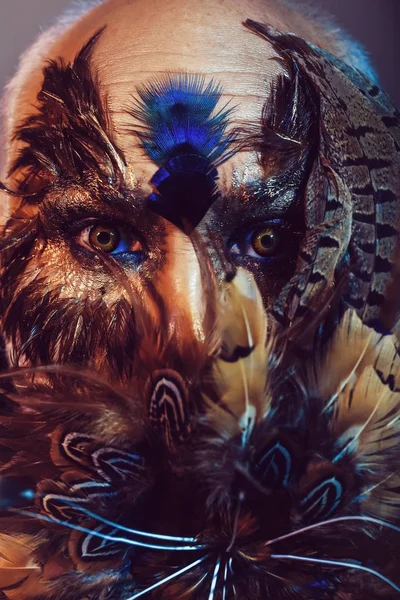 Human eye with peacock feather — Stock Photo © Tverdohlib.com #174731516