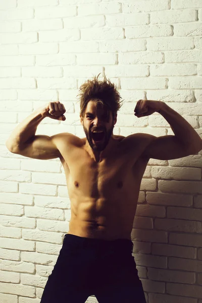 Excited handsome man or bodybuilder - Stock Image - Everypixel