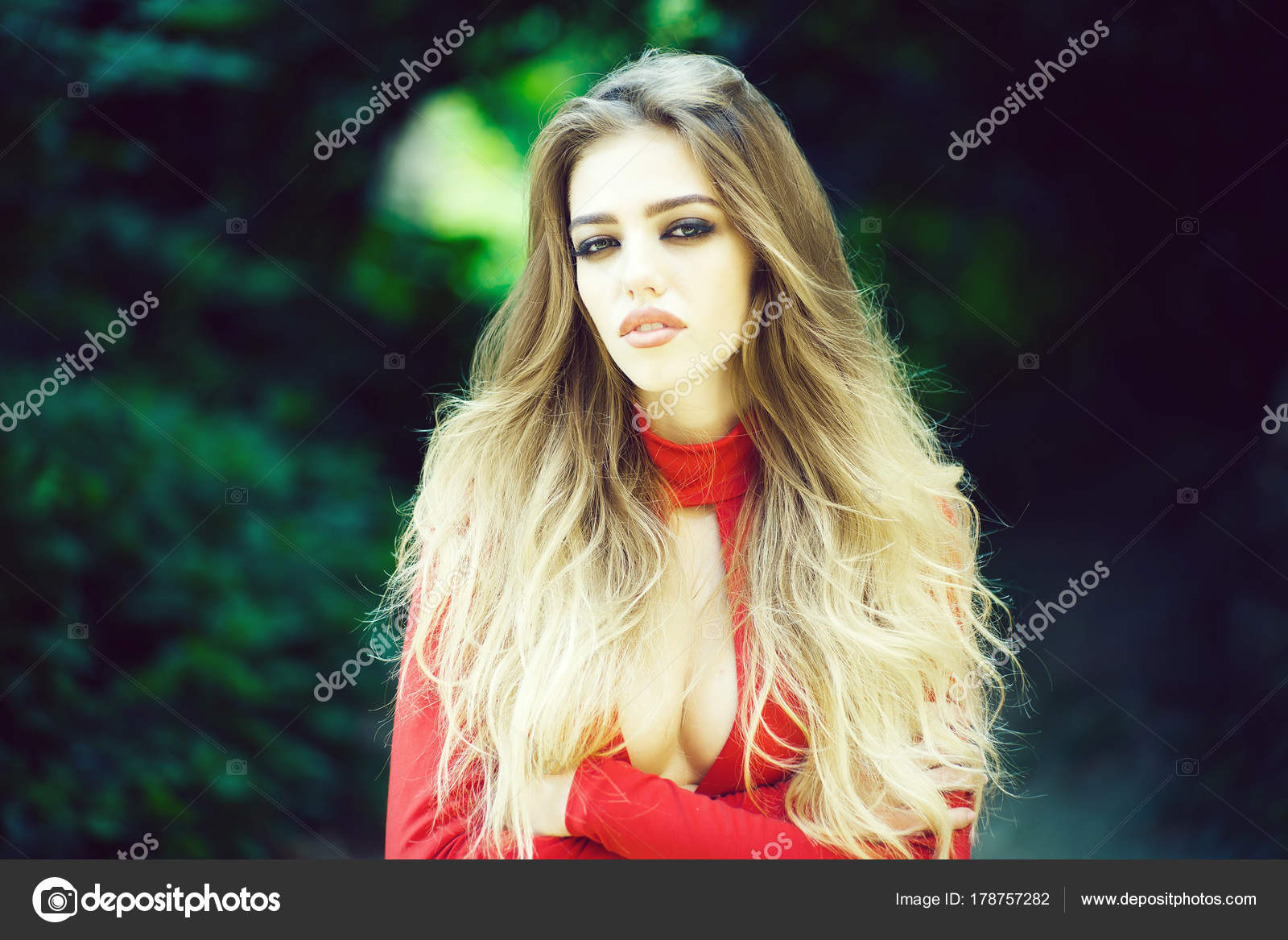Sexy young woman with long hair — Stock Photo © Tverdohlib.com #178757282