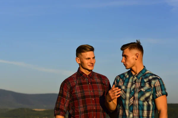 Twin brothers man smile, relations. - Stock Image - Everypixel