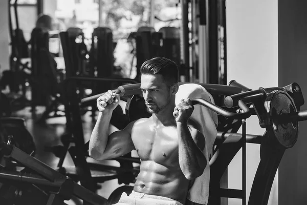 muscular man training in gym - Stock Image - Everypixel