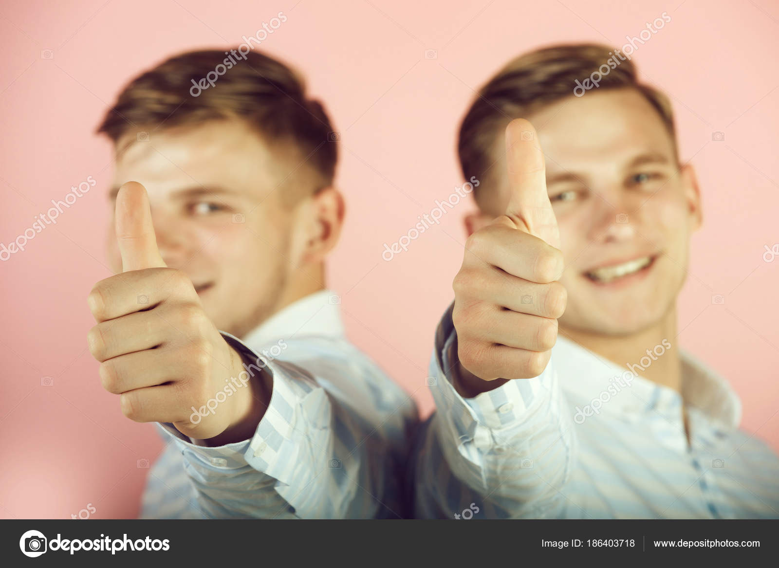 Two thumbs up hand gestures — Stock Photo © Tverdohlib.com #186403718