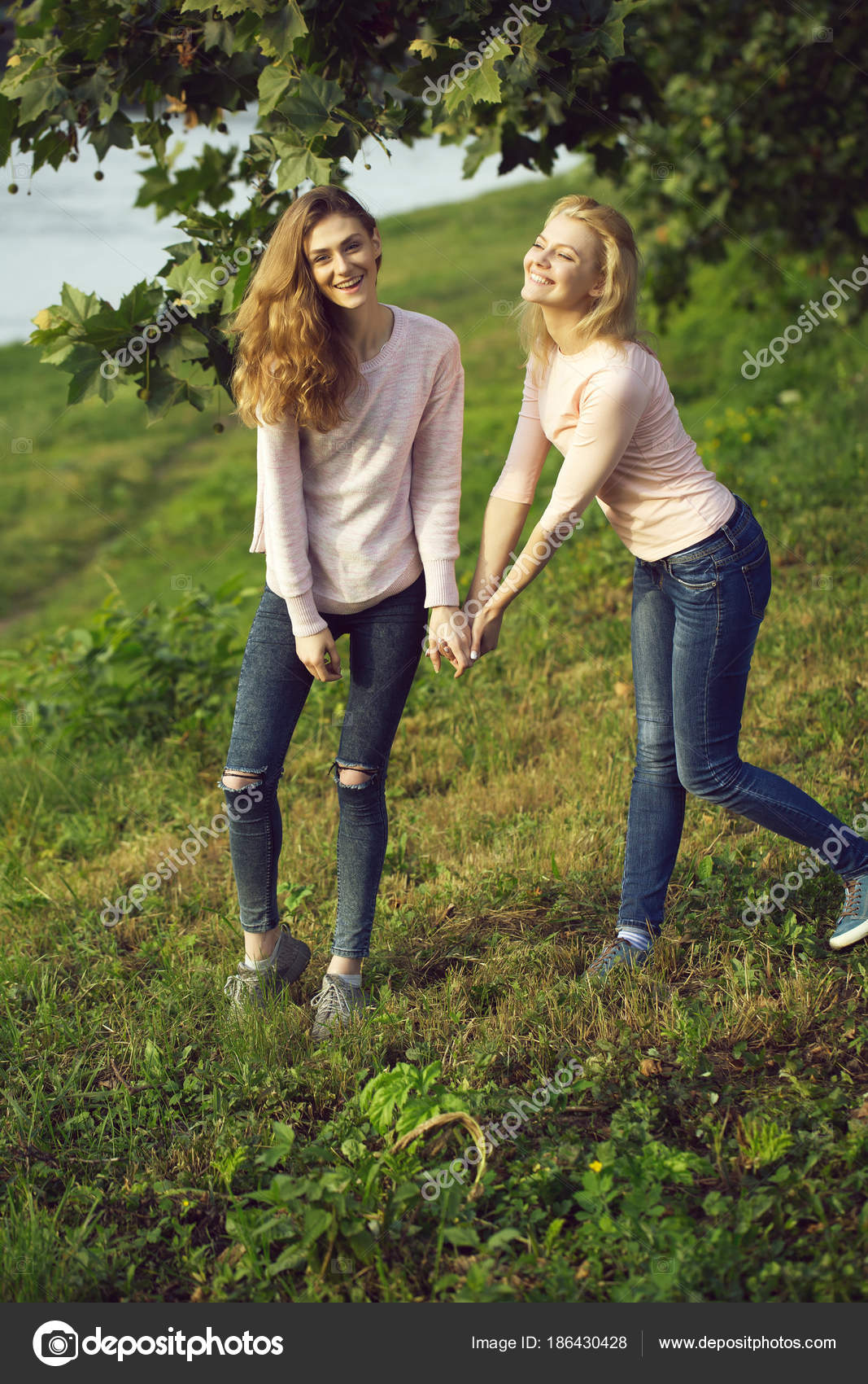 Two Little Girls Best Friends Holding Hands