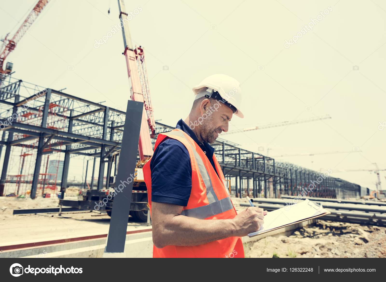Engineer Worker writing building plan Stock Photo by ©Rawpixel 126322248