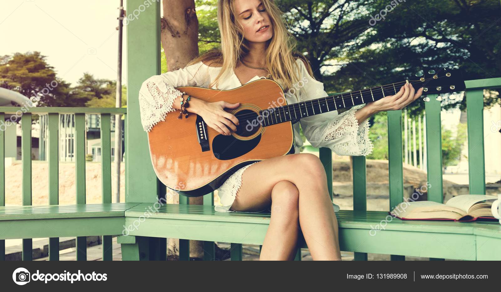 Blonde woman Playing acoustic Guitar — Stock Photo © Rawpixel #131989908 Blonde woman Playing acoustic Guitar — Stock Photo © Rawpixel #131989908