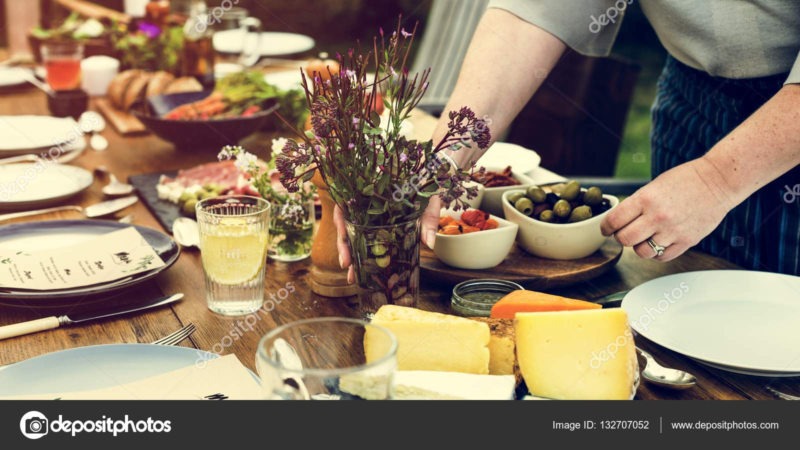 Woman Preparing Table for Dinner Stock Photo by ©Rawpixel 132707052