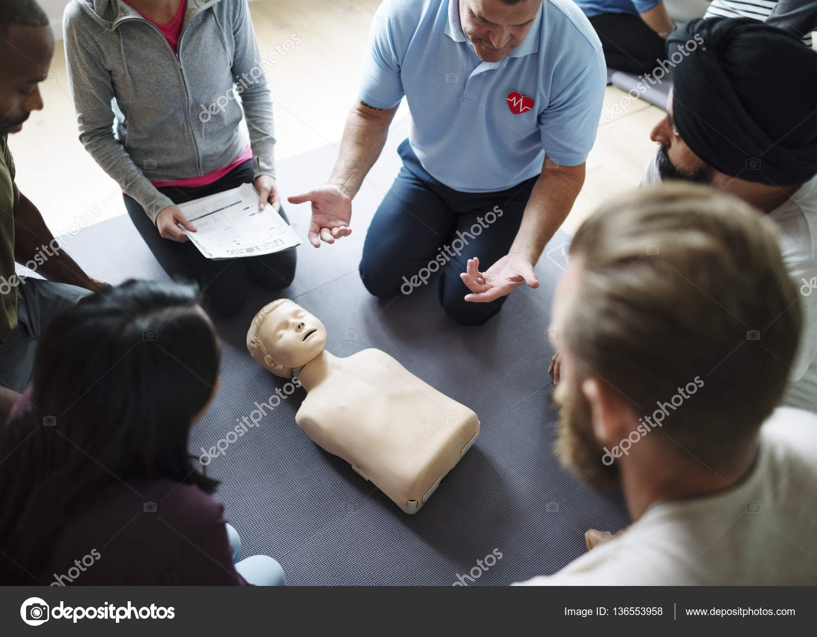 People learning CPR First Aid Training Stock Photo by ©Rawpixel 136553958