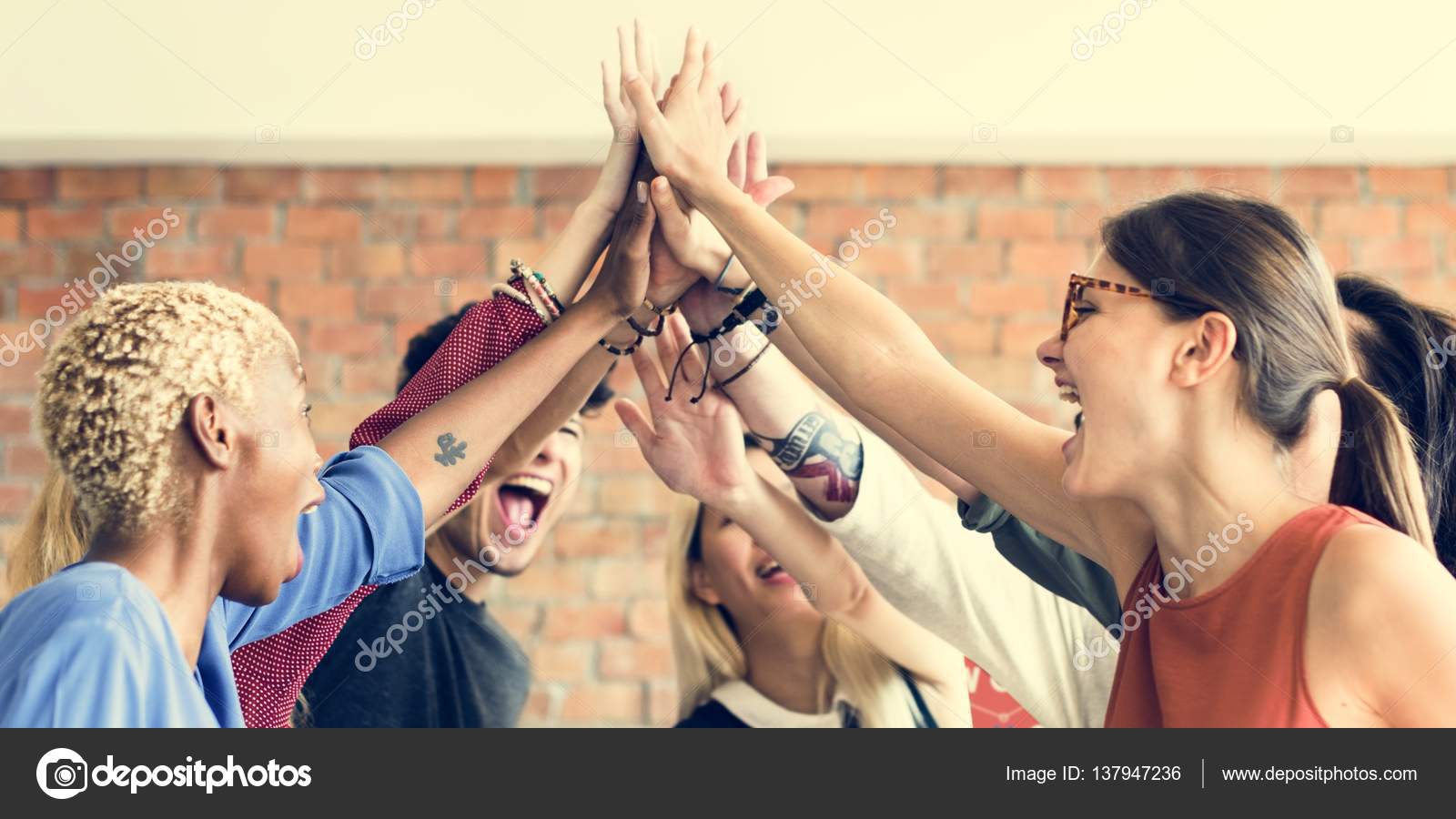 Business team giving hive five — Stock Photo © Rawpixel #137947236