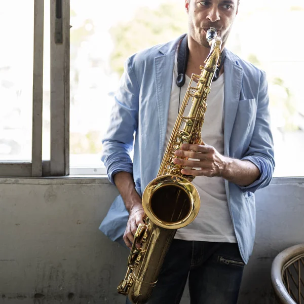 Young man with Saxophone Stock Photo by ©Rawpixel 128515058