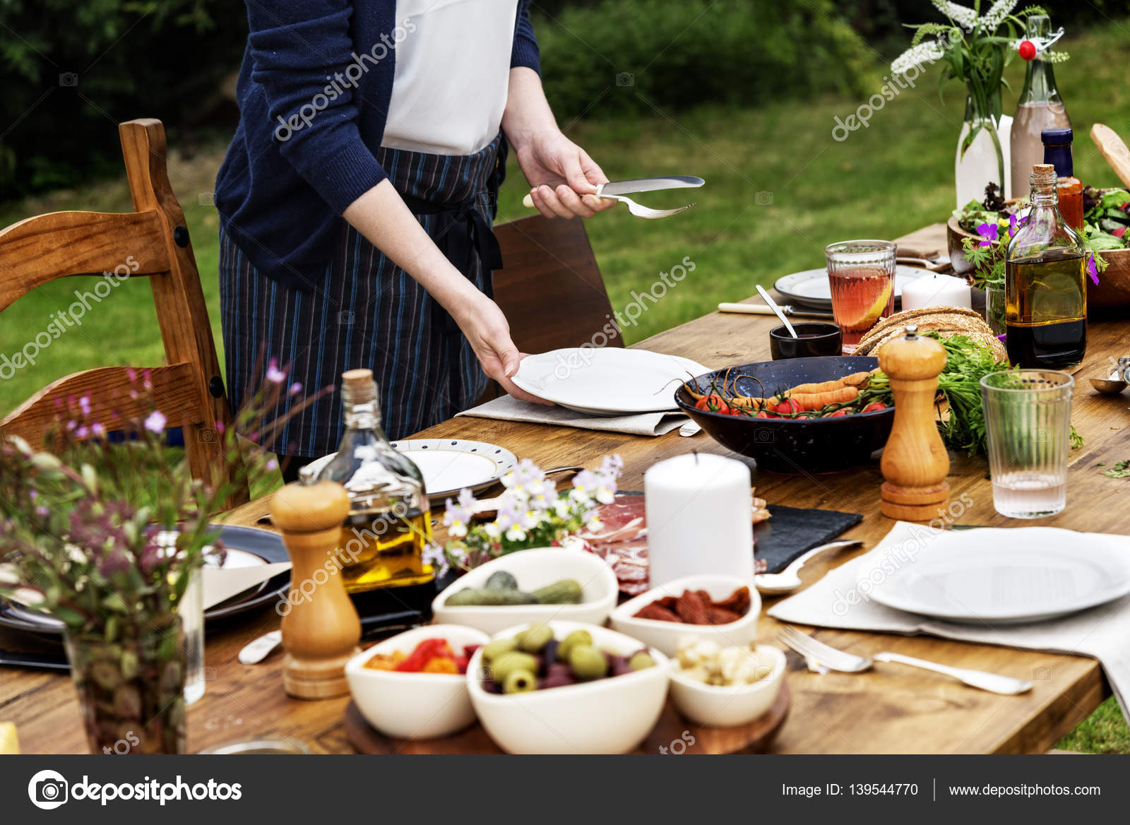 Woman Preparing Table for Dinner Stock Photo by ©Rawpixel 139544770