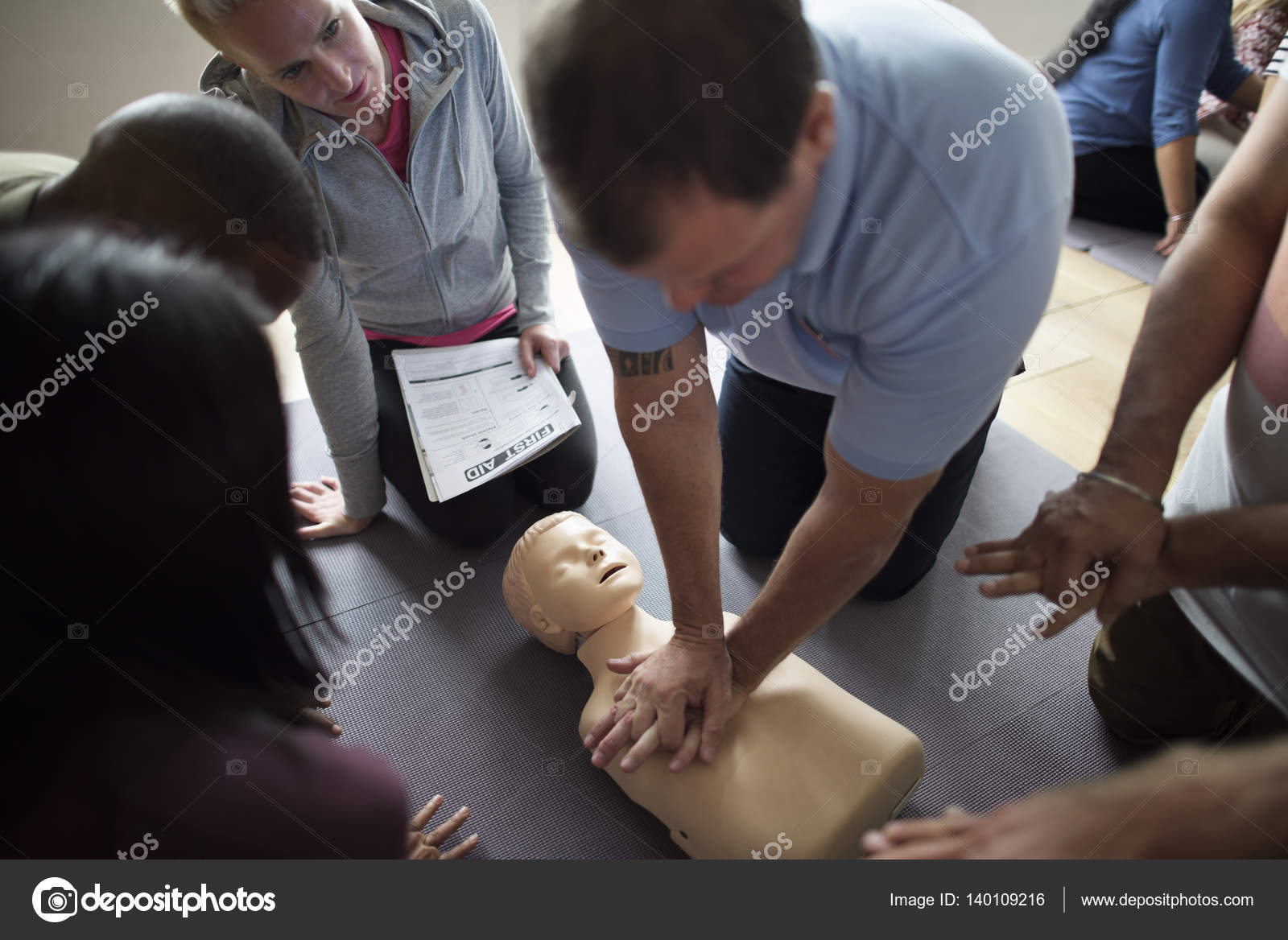 People learning CPR First Aid Training — Stock Photo © Rawpixel #140109216