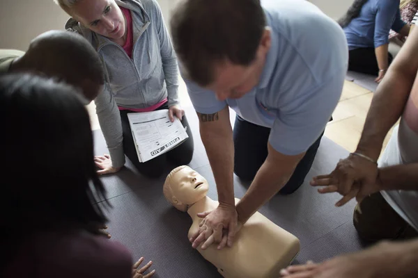 People learning CPR First Aid Training — Stock Photo © Rawpixel #139531278