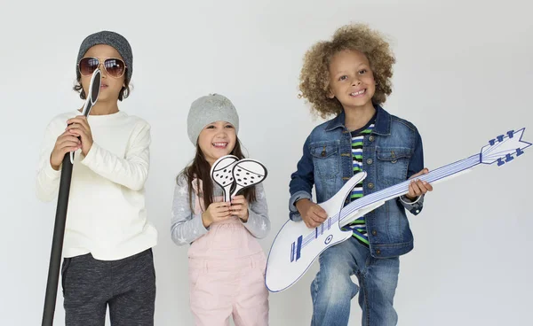 Children playing instruments Stock Photos, Royalty Free Children ...