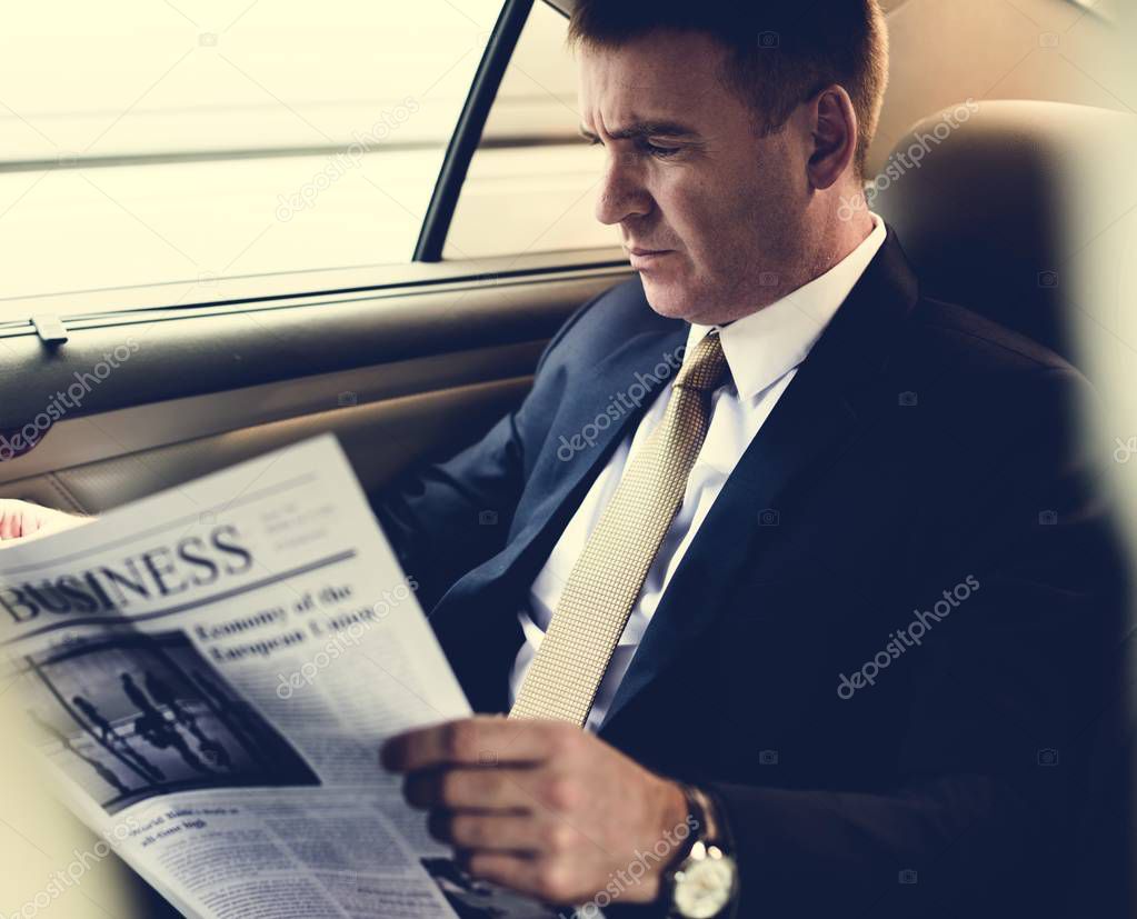 Businessman Reading Newspaper — Stock Photo © Rawpixel #144361879 Businessman Reading Newspaper — Stock Photo © Rawpixel #144361879