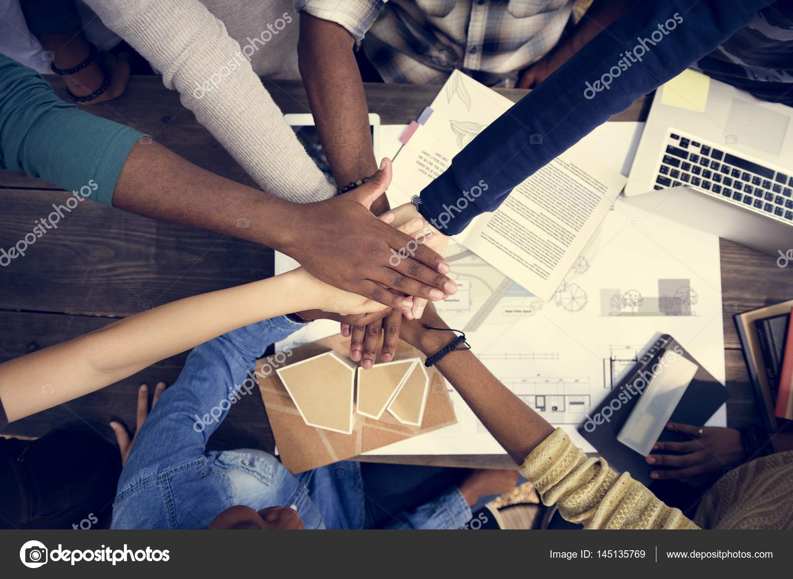 Students holding hands together Stock Photo by ©Rawpixel 145135769