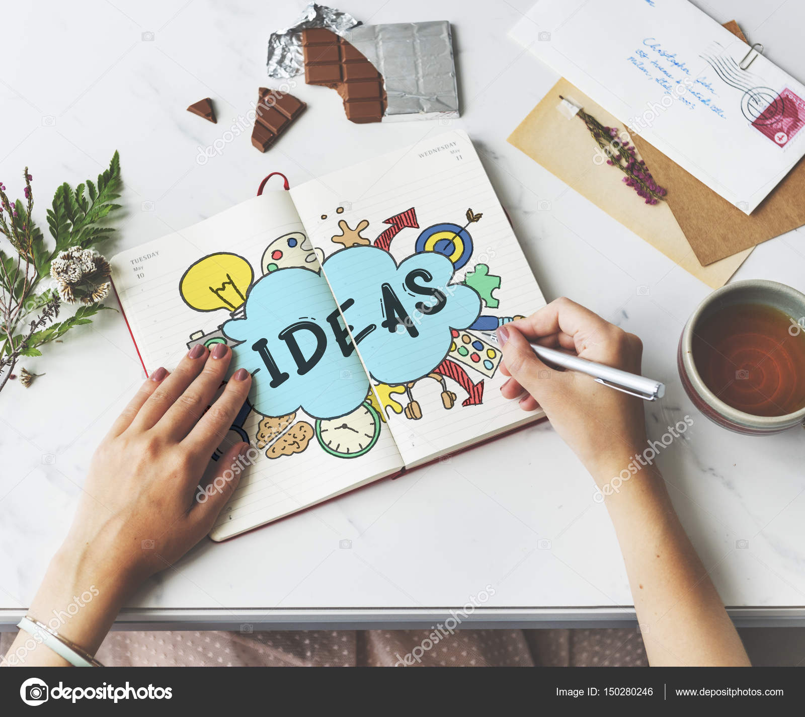 Woman drawing in notebook — Stock Photo © Rawpixel #150280246