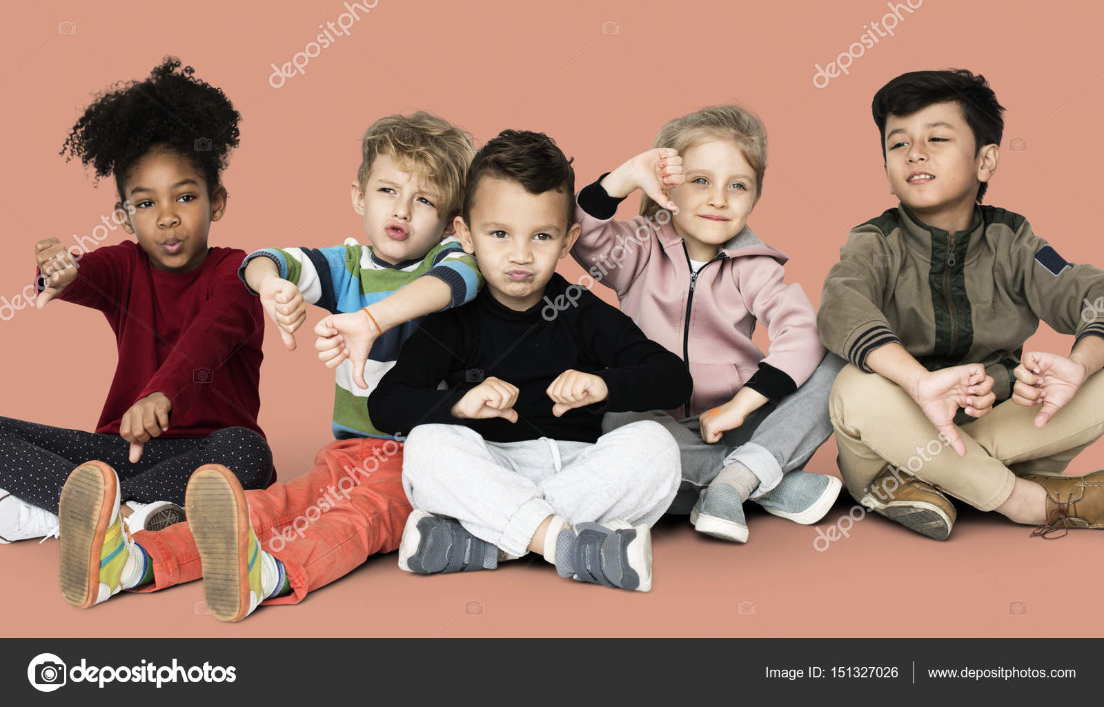 Little Children sitting on the floor — Stock Photo © Rawpixel #151327026
