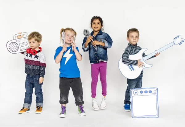 Children playing musical instruments Stock Photos, Royalty Free ...