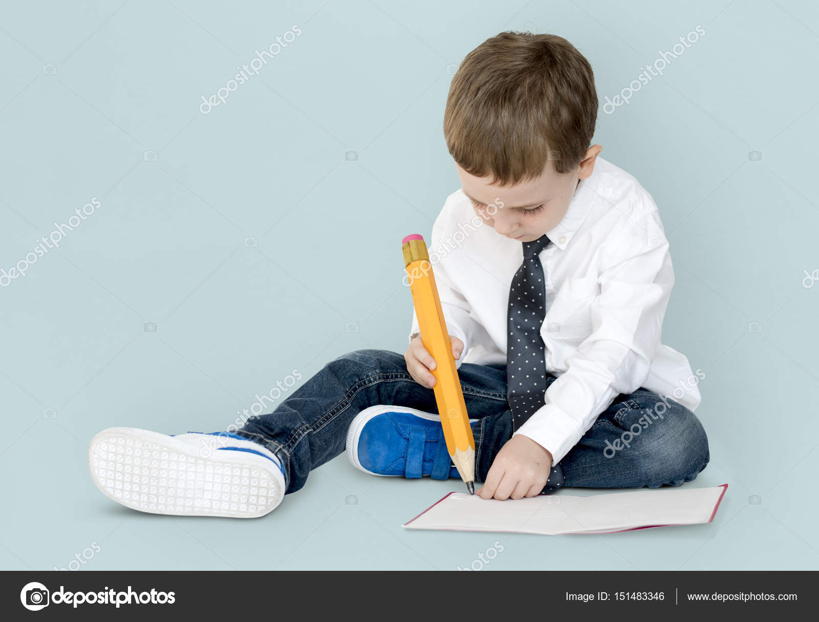 Boy writing with big pencil — Stock Photo © Rawpixel #151483346