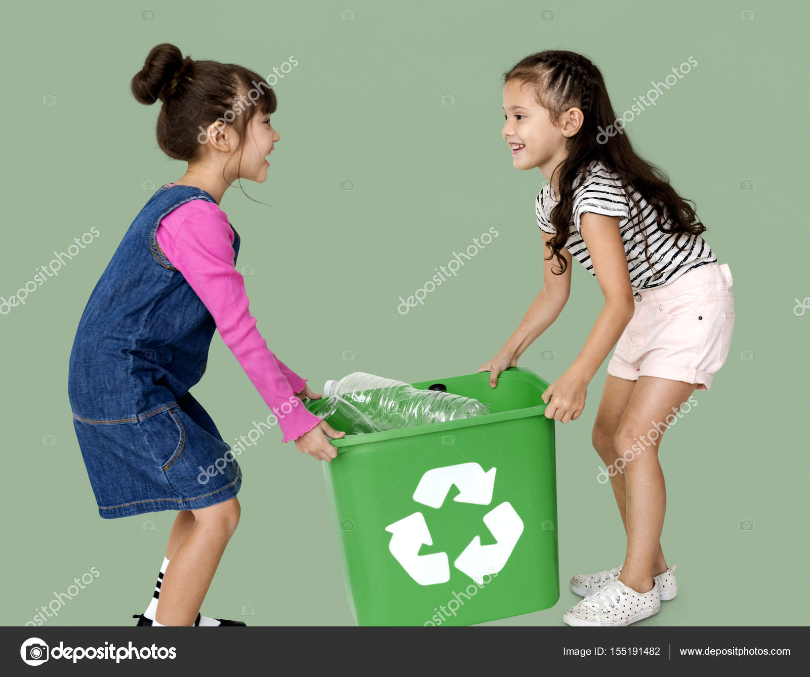 Two girls carrying recycling bin Stock Photo by ©Rawpixel 155191482