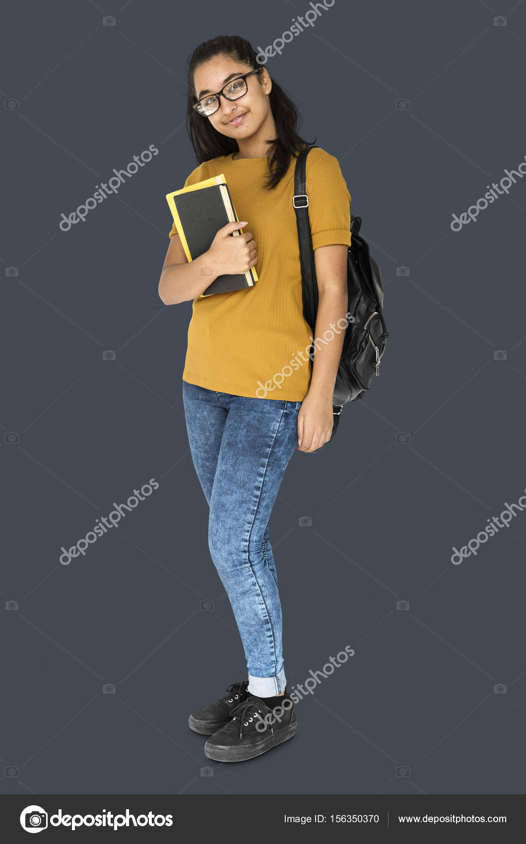 Indian student holding textbook Stock Photo by ©Rawpixel 156350370