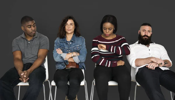 People sitting on chairs in studio — Stock Photo © Rawpixel #159772742