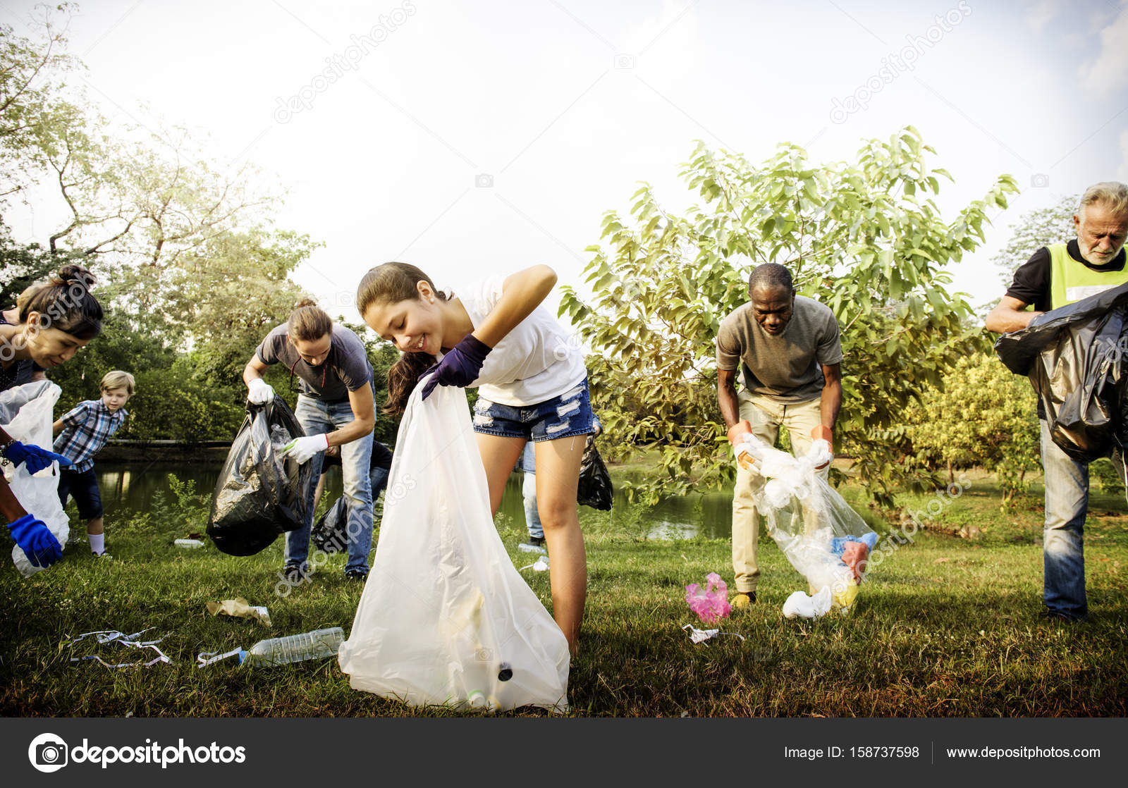 People Picking Up Trash in The Park Stock Photo by ©Rawpixel 158737598