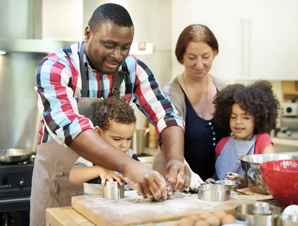 Family baking together in the kitchen, original photoset - Stock Image ...