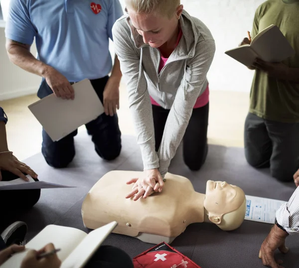 People learning CPR First Aid Training — Stock Photo © Rawpixel #139531278