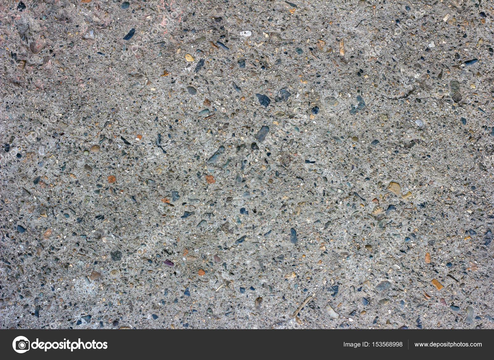 Concrete with small stones background Stock Photo by ©nesteaav 153568998