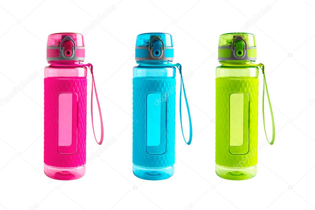 Tres diferentes botellas o frascos deportivos de plástico y caucho ...