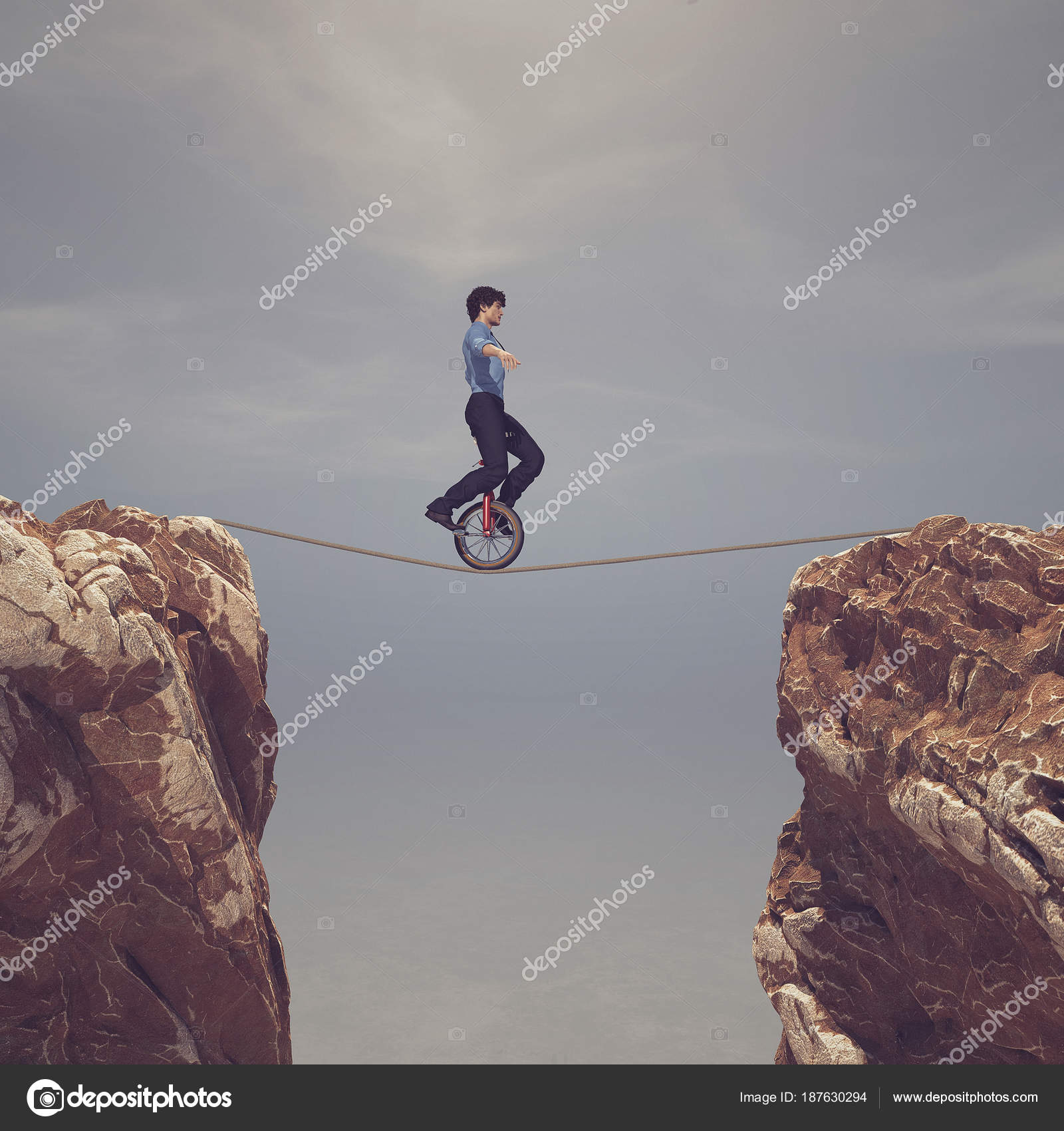 Man pedaling on rope between two mountains — Stock Photo © orlaimagen ...