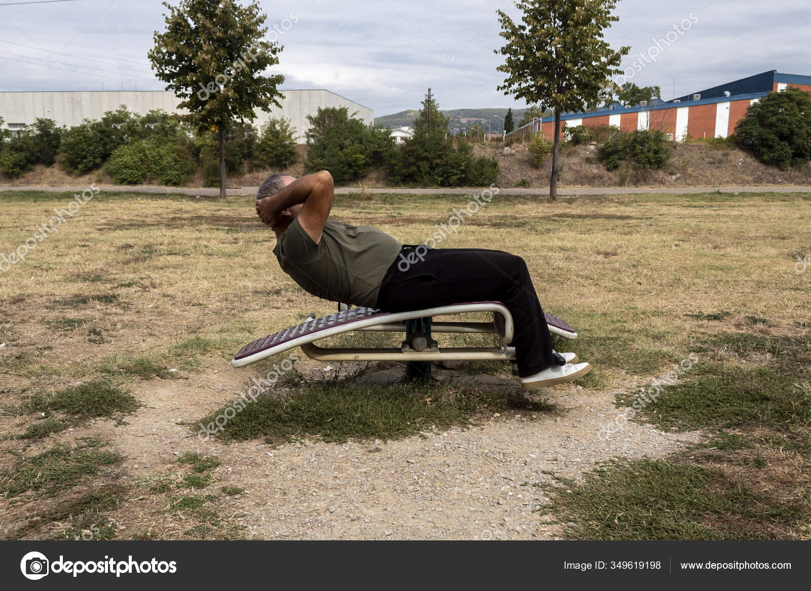 Side View Middle Age Man Doing Crunches Abdominal Bench Playground ...