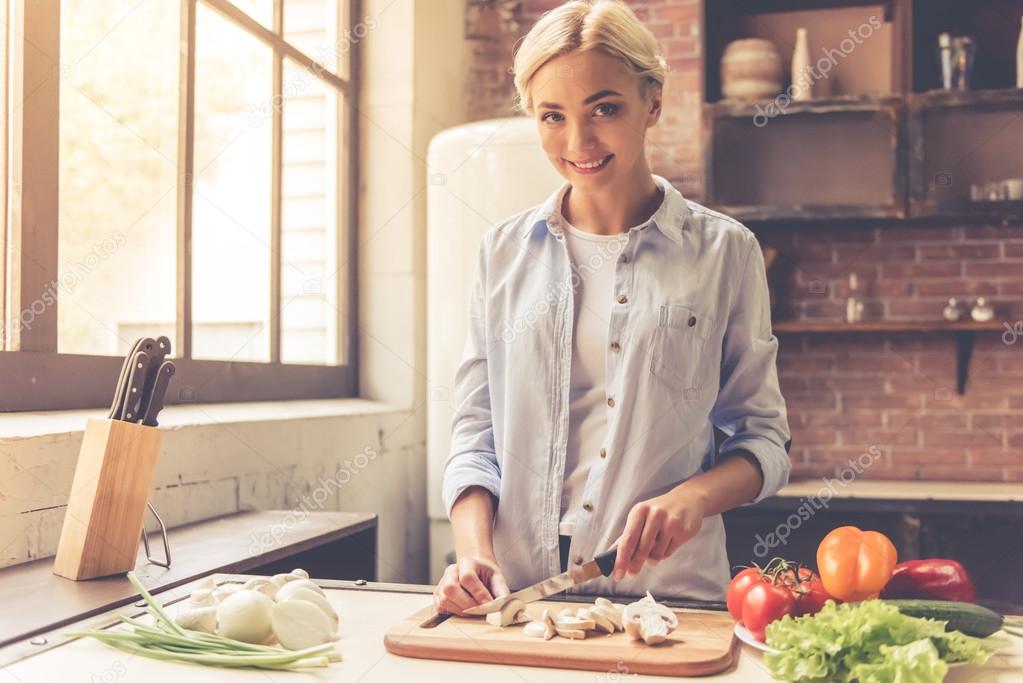 Beautiful girl cooking Stock Photo by ©vadimphoto1@gmail.com 128735894