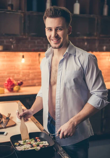 Sexy guy cooking Stock Photo by ©vadimphoto1@gmail.com 139826426