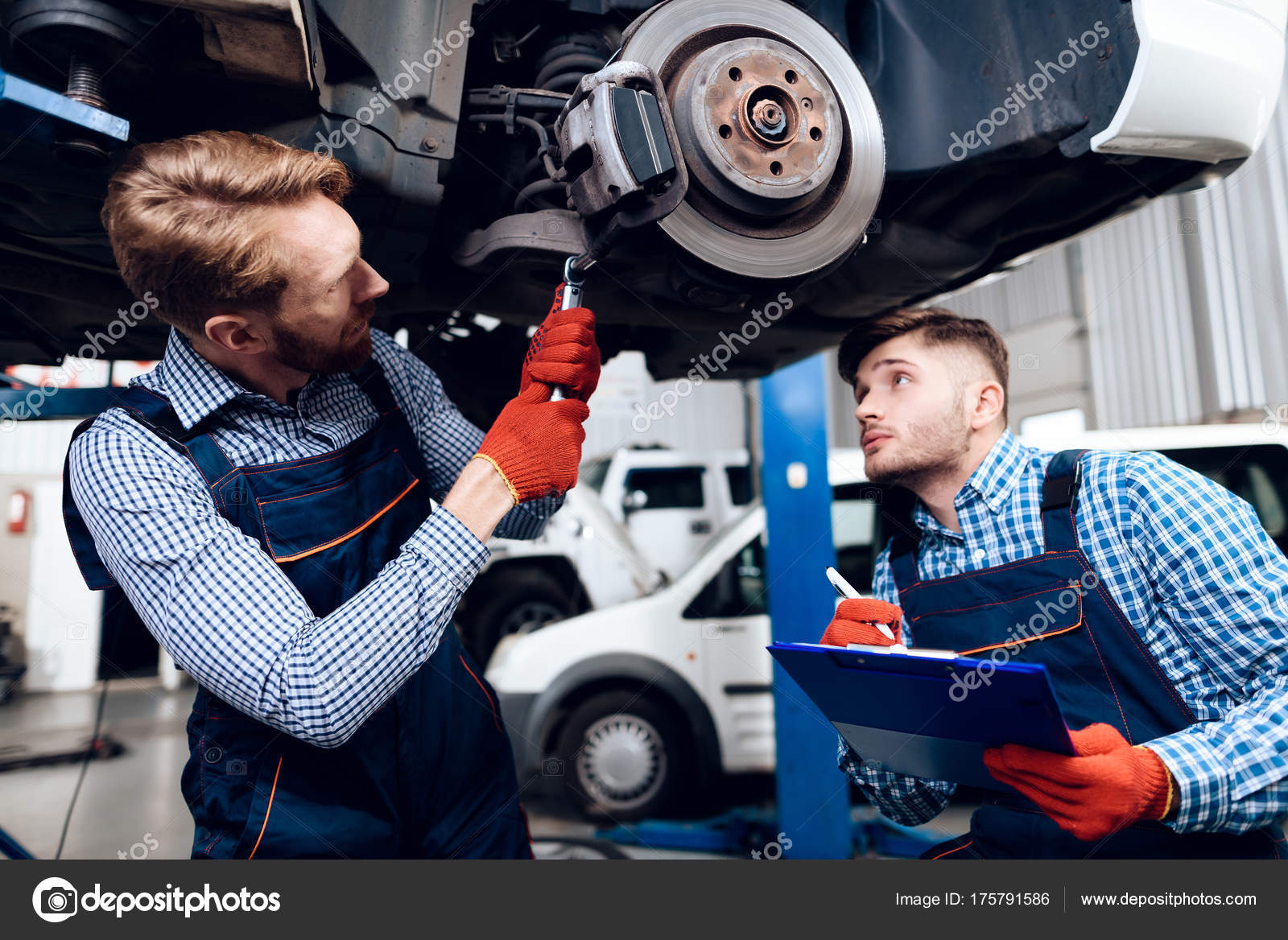 Car Mechanics At Work