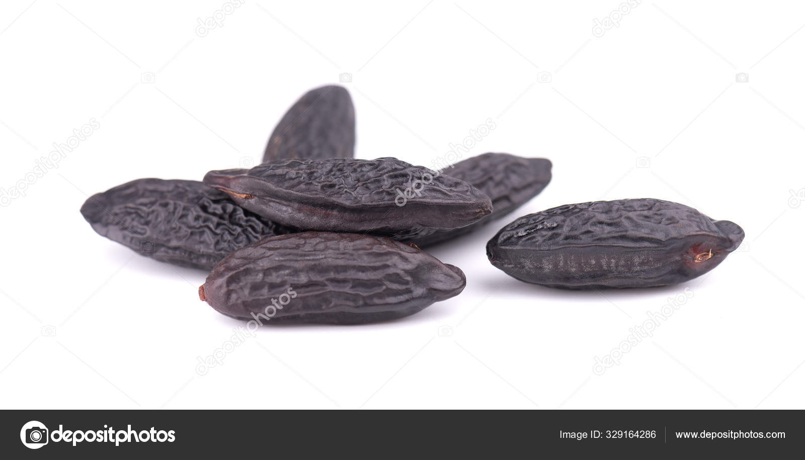 Tonka beans isolated on white background. Bean of Dipteryx odorata ...